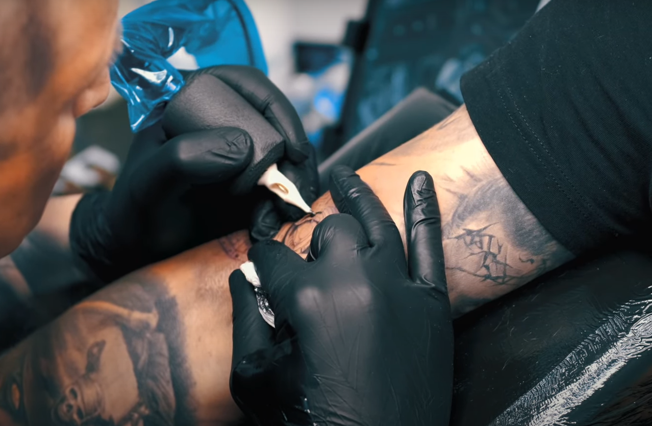 Can You Cover Up a Color Tattoo With Black? - TattooProfy