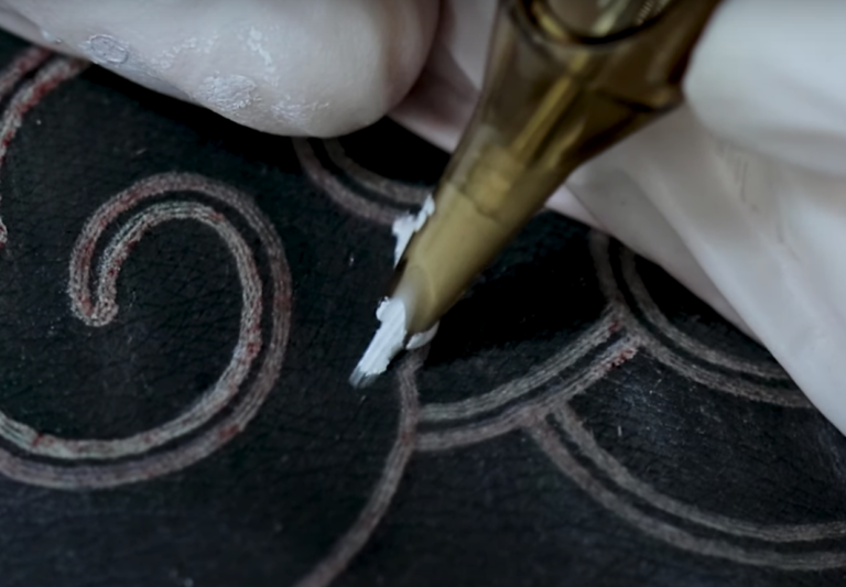 Can You Tattoo White Over Black? - TattooProfy